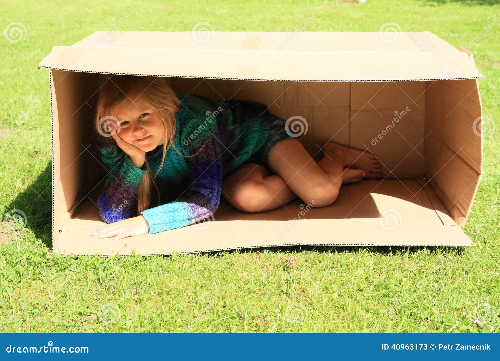Child hiding in box stock image. Image of think, grass - 40963173