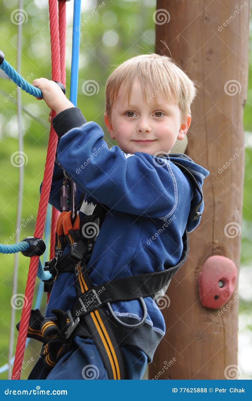 Child on high rope stock photo. Image of playground, adventure - 77625888