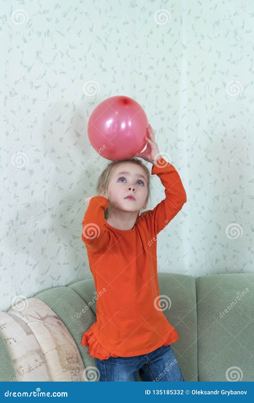 Child hits the balloon stock photo. Image of balloon - 135185332