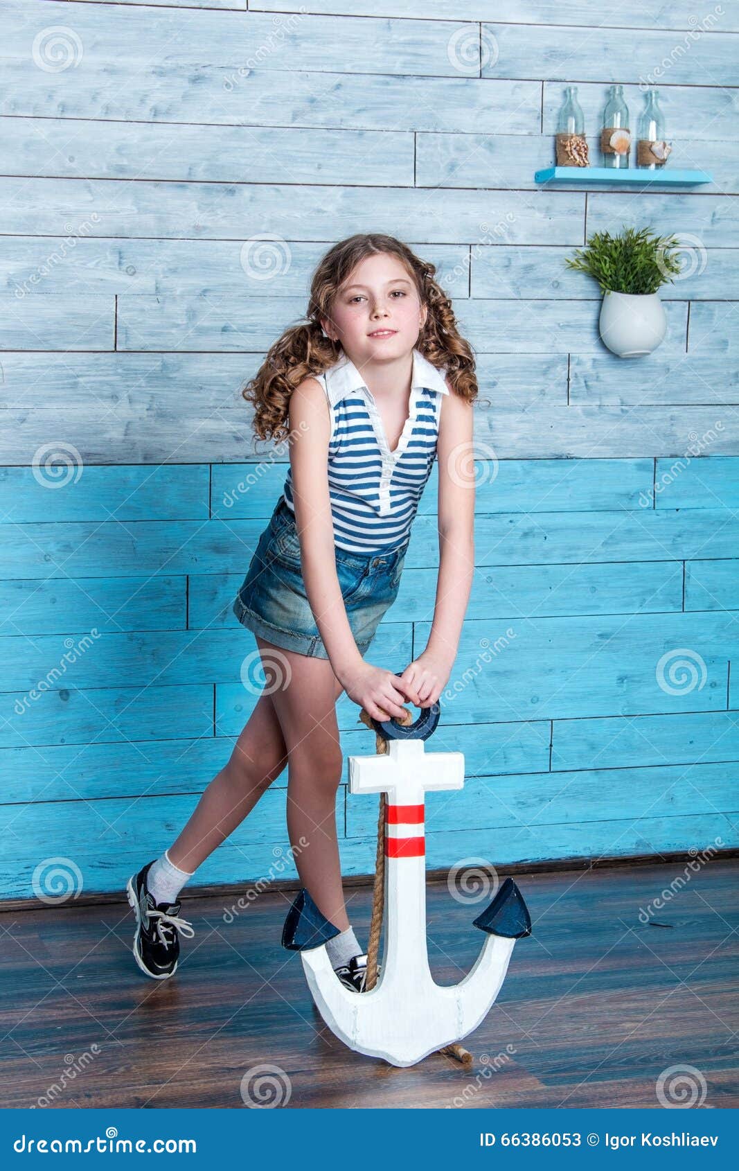 Child holding anchor stock image. Image of slim, stand - 66386053