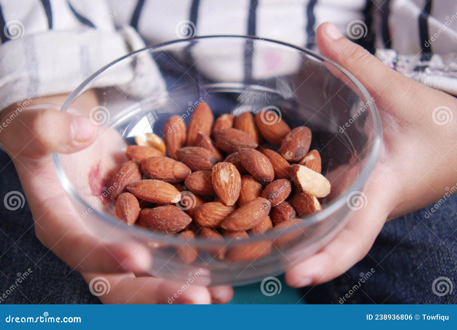 Child Holding a Bowl of Almond Stock Photo - Image of protein, hand ...