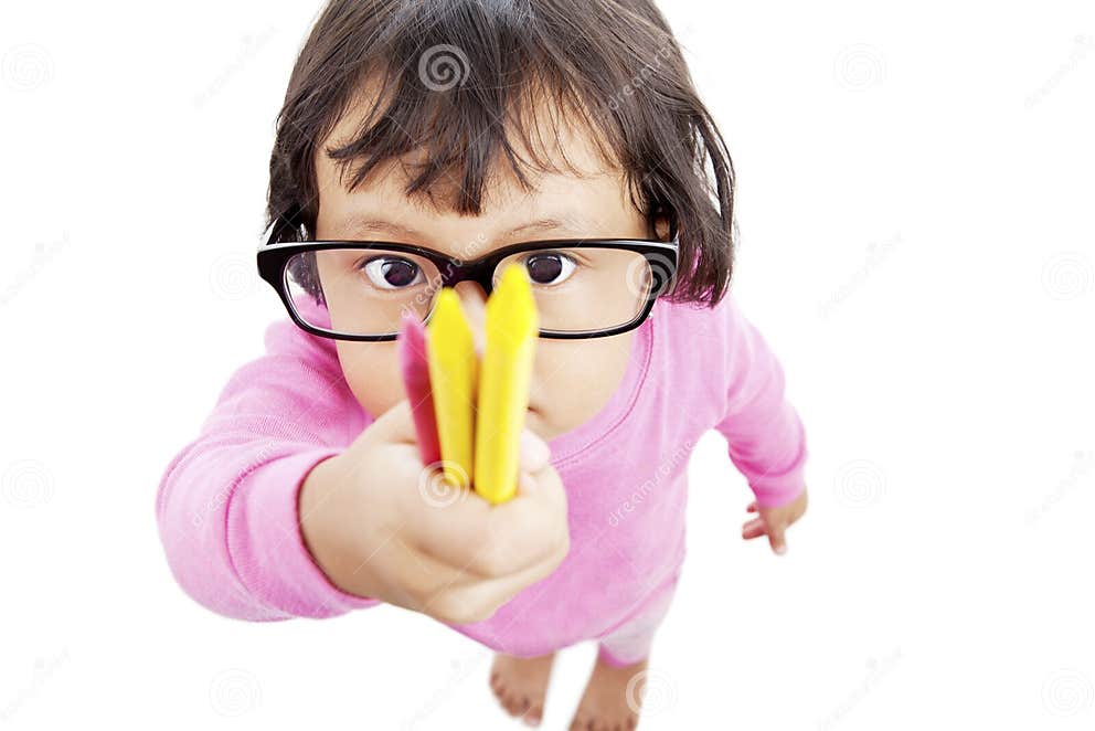 Child holding crayon stock image. Image of instrument - 25992123