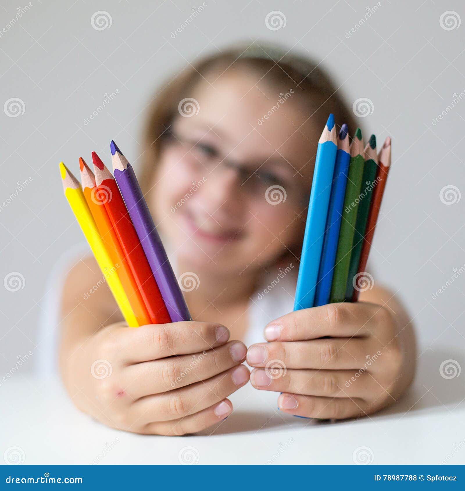 Child holding crayons stock photo. Image of learning - 78987788