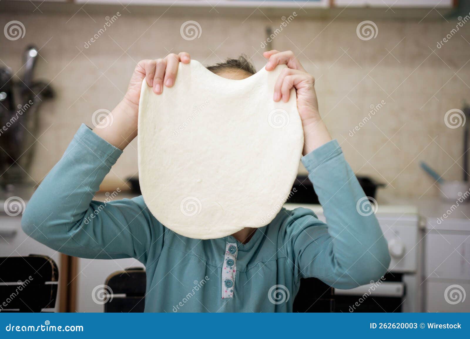 Child Holding a Dough in Front of Her Face Stock Image - Image of ...