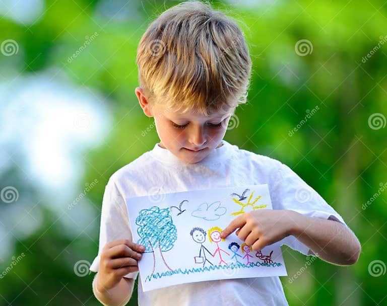 Child holding drawing stock photo. Image of portrait - 17218430