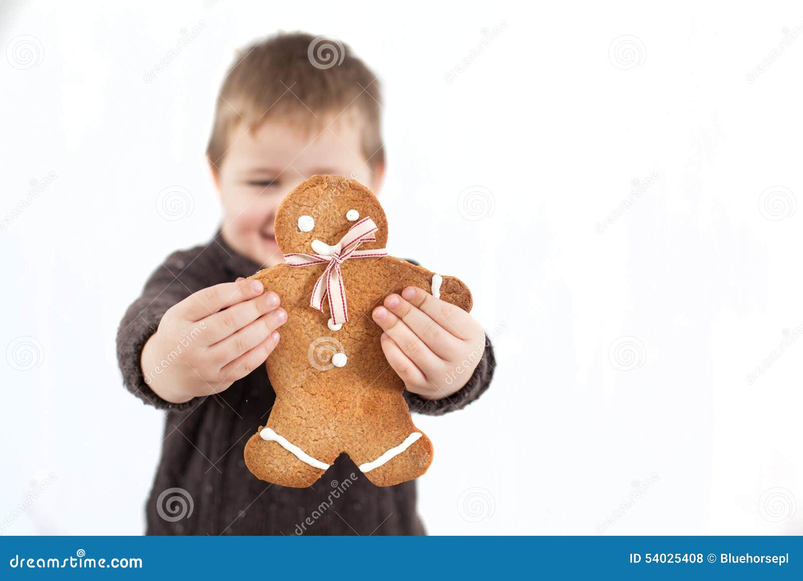 Child Holding Gingerbread Man Stock Photo - Image of baking, hold: 54025408