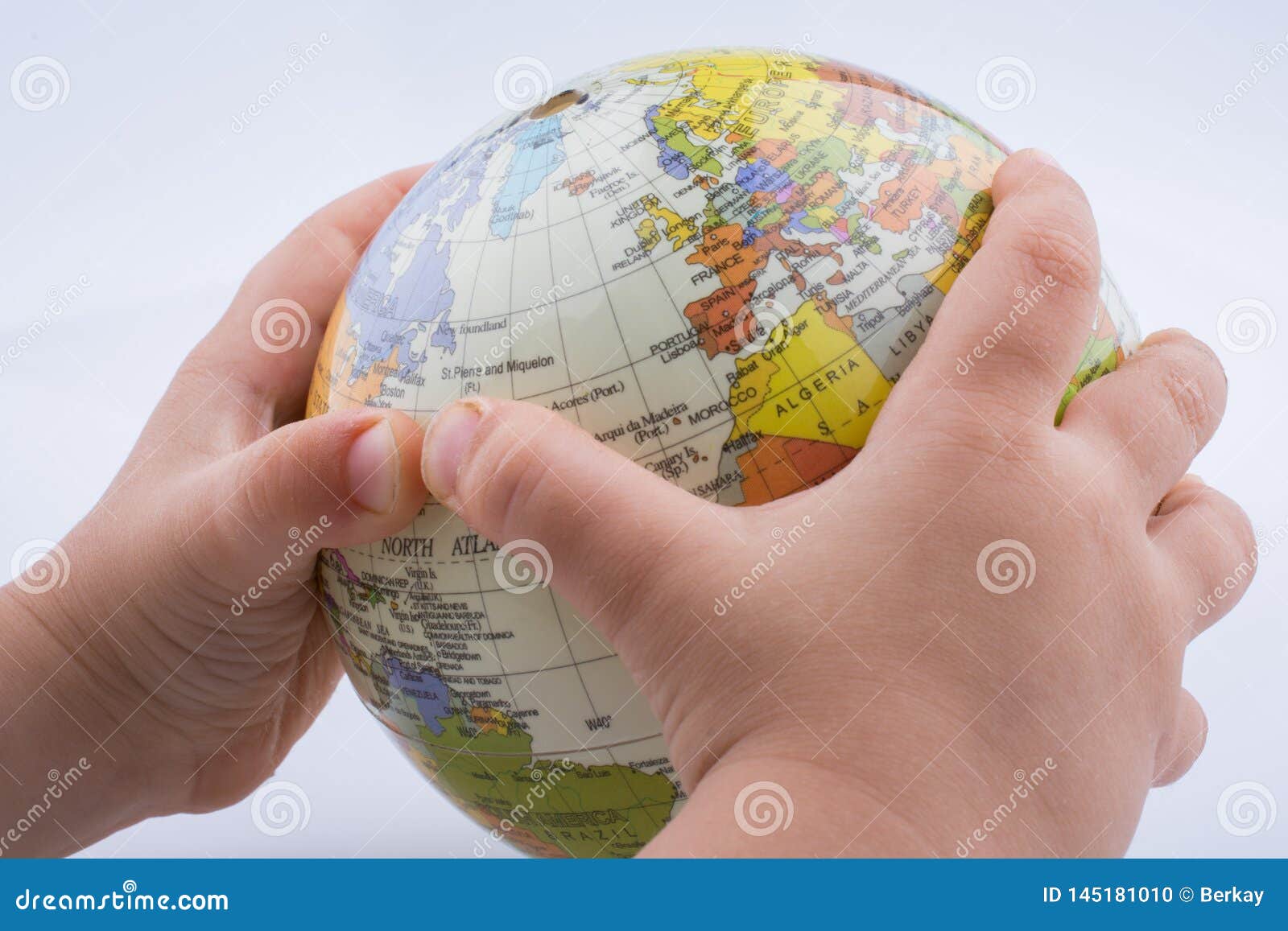 Child Holding a Globe in His Hand Stock Photo - Image of students, kids ...