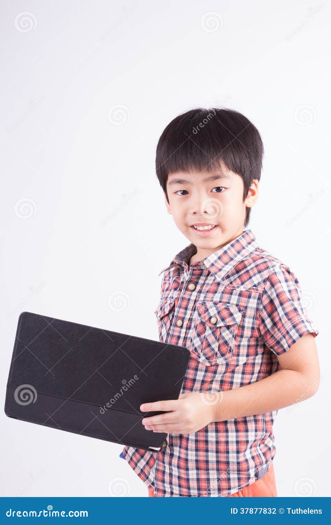 Child holding tablet pc stock photo. Image of nerd, computer - 37877832