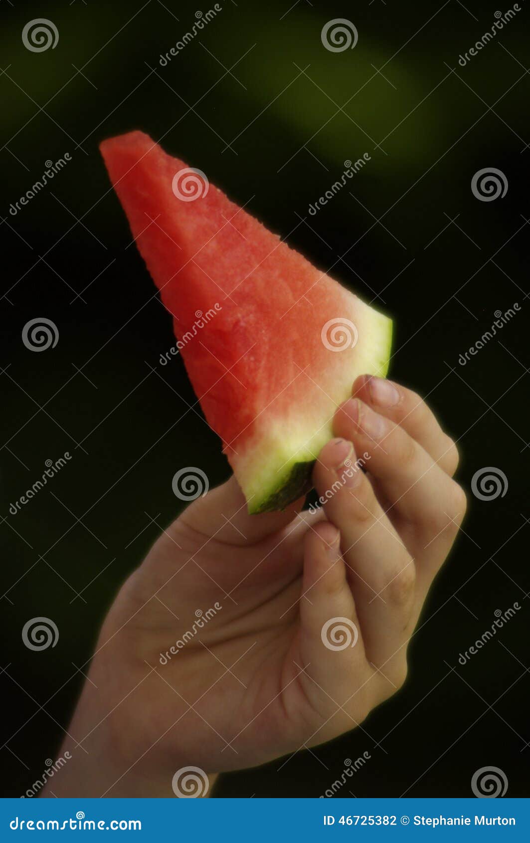 A Child Holding a Watermelon Slice Stock Photo - Image of snack, biting ...
