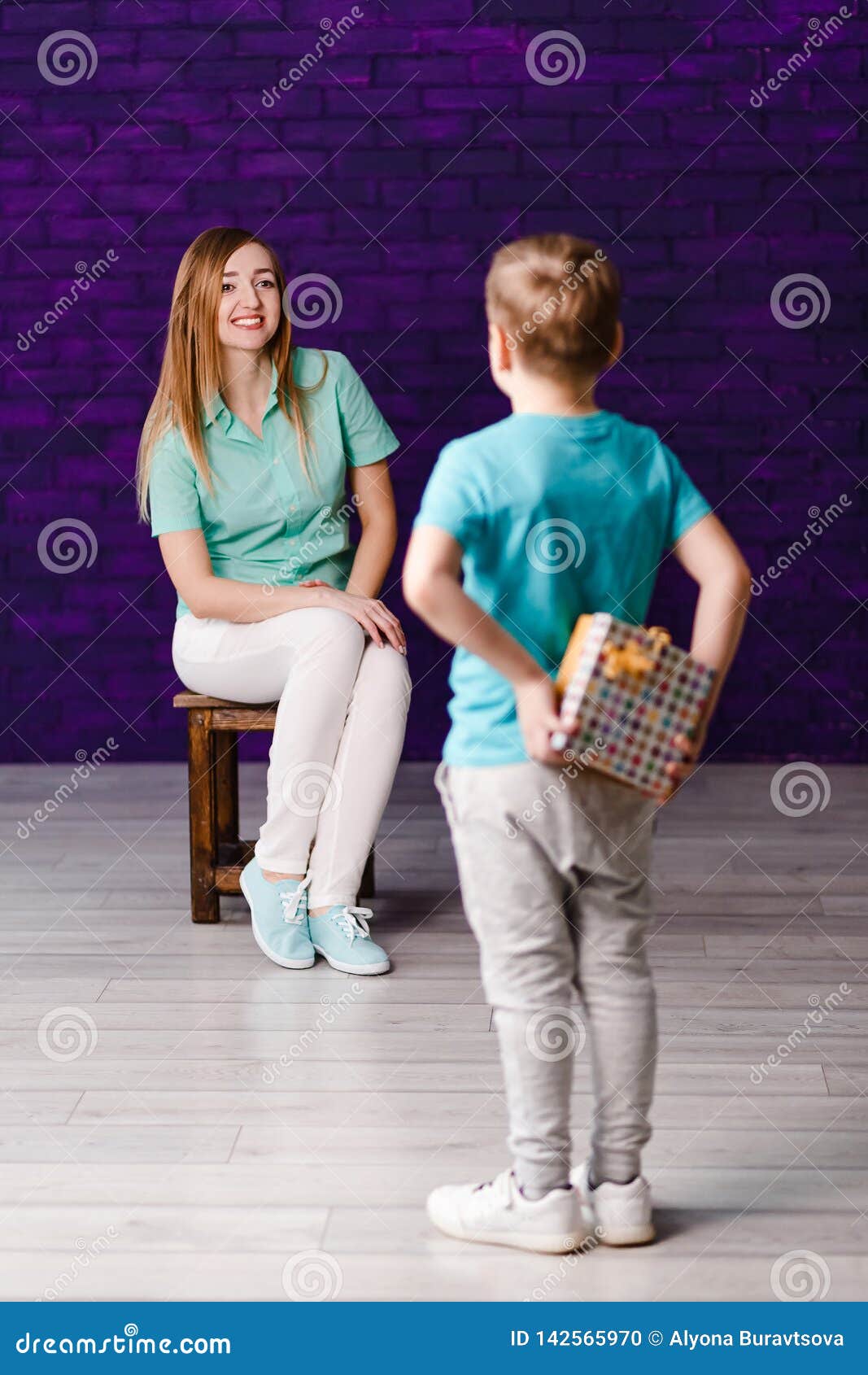 The Child Holds Behind His Back Gift for Mom Stock Photo - Image of ...