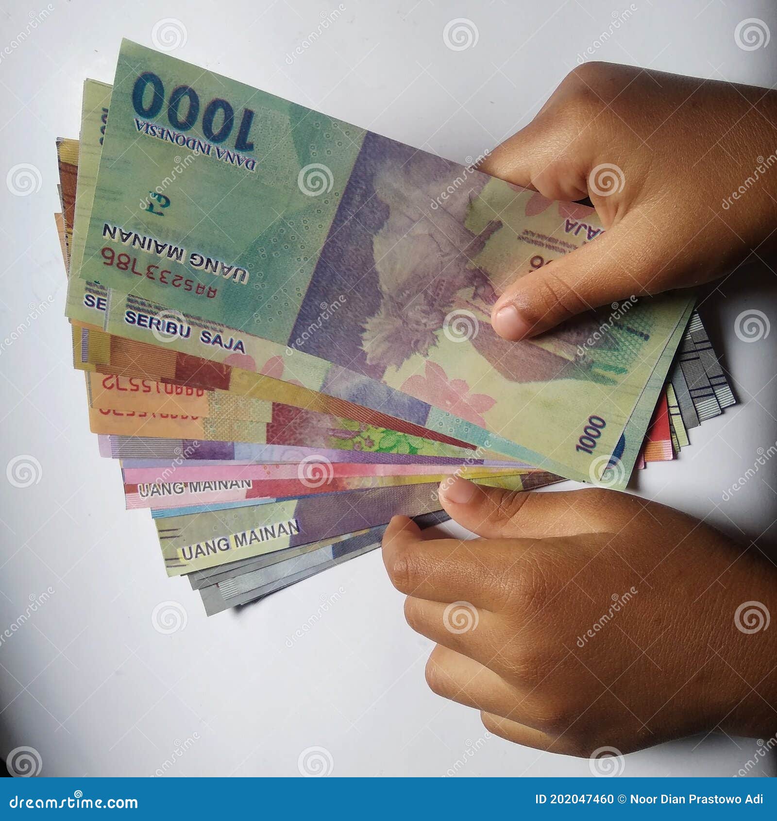 A Child Holds Toy Banknotes As a Prop Stock Photo - Image of paper ...