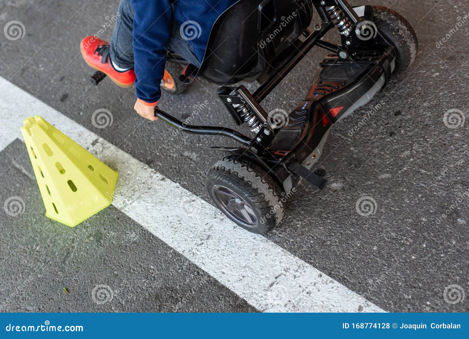Child on Hoverboard with Adapted Seat Stock Photo - Image of motor ...