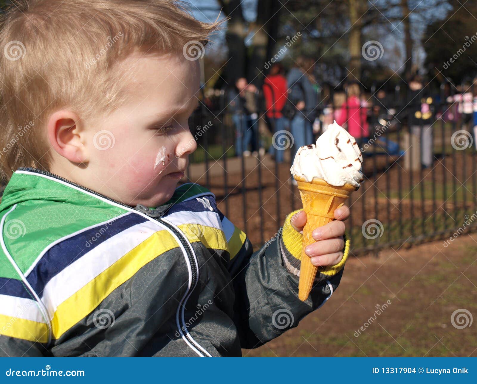 Child with ice cream stock photo. Image of people, playground - 13317904