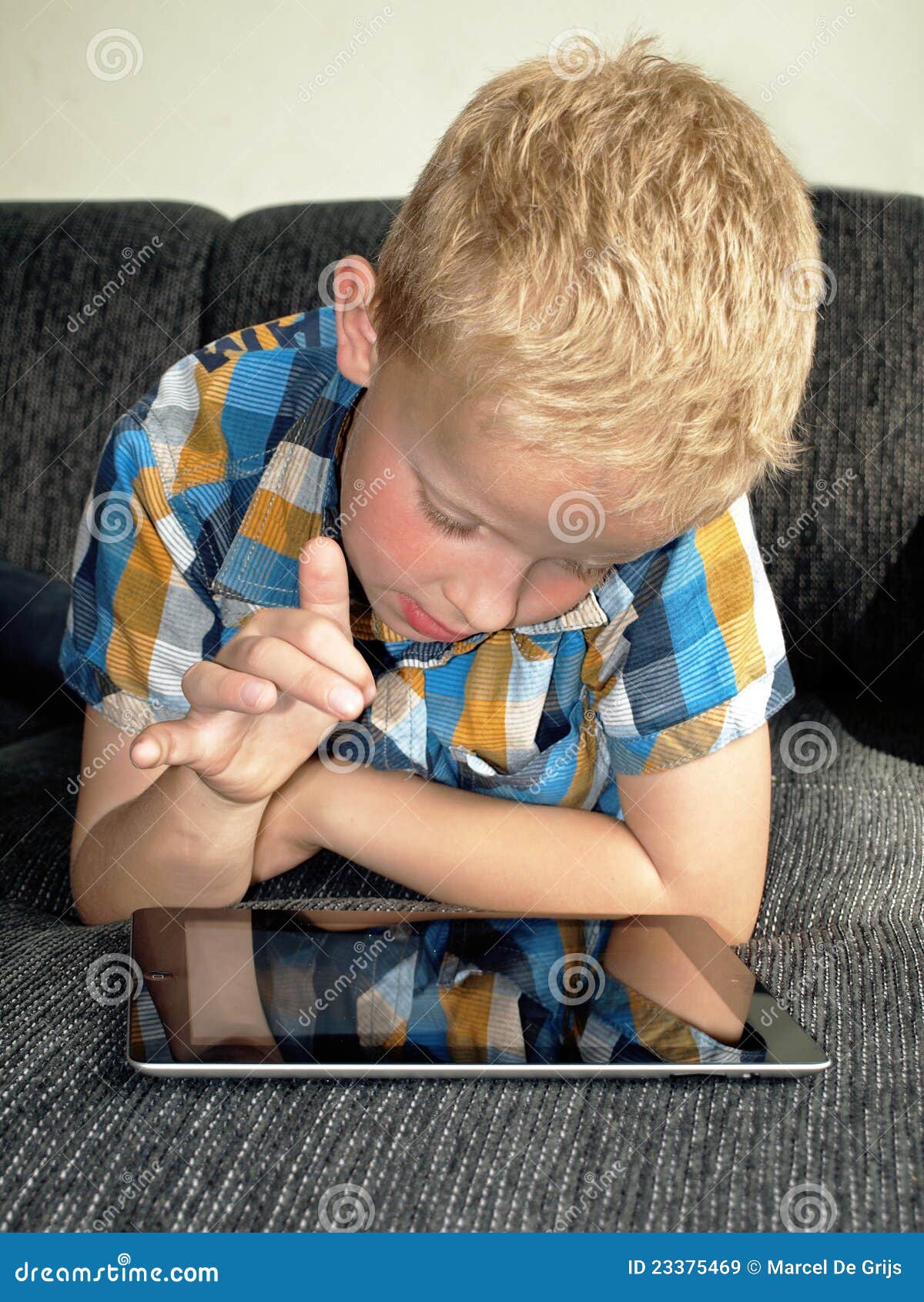 Child on ipad stock image. Image of samsung, learning - 23375469