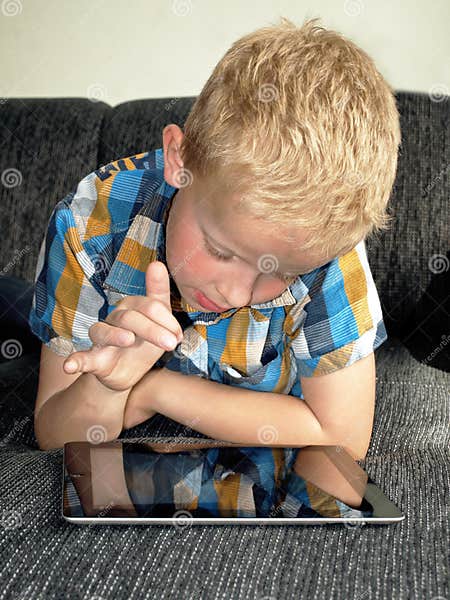 Child on ipad stock image. Image of samsung, learning - 23375469