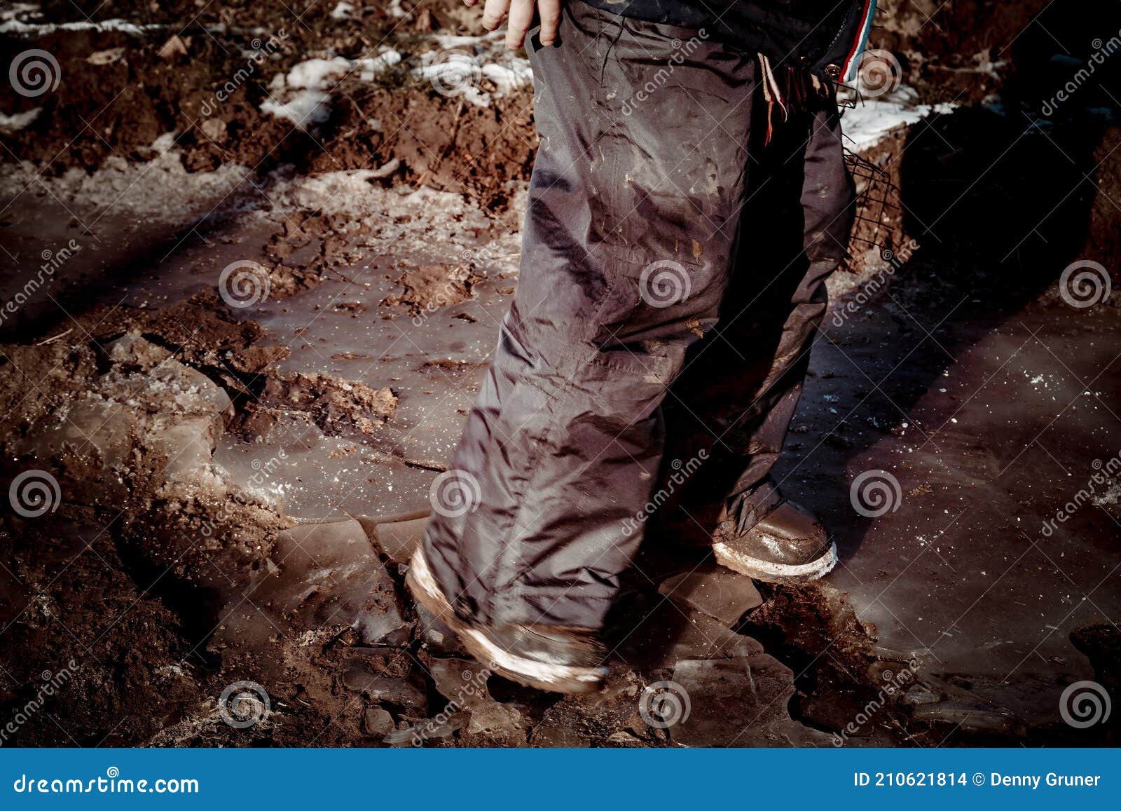 Child Jumping Around in the Mud Stock Photo - Image of happiness ...