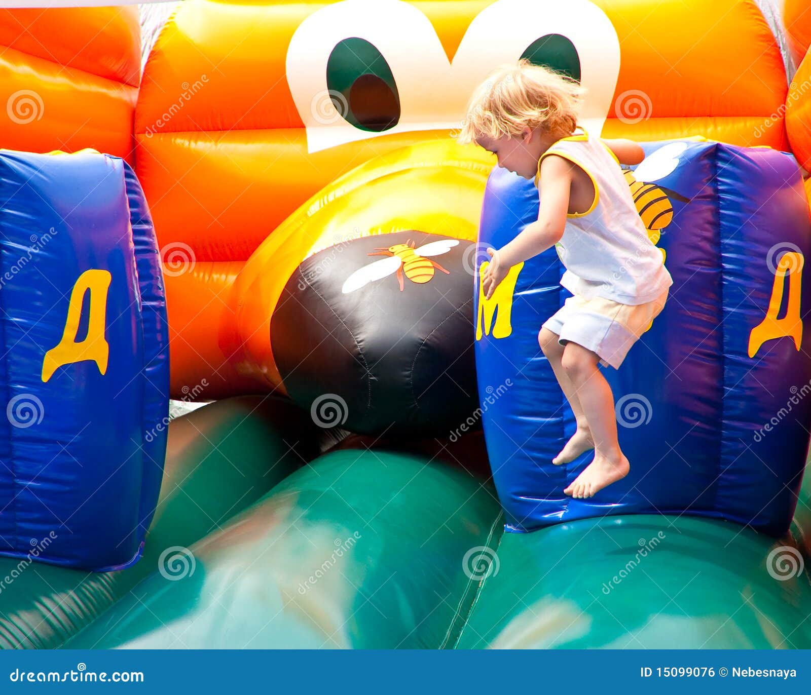 Child Jumping On Bouncy Castle Royalty-Free Stock Image | CartoonDealer ...