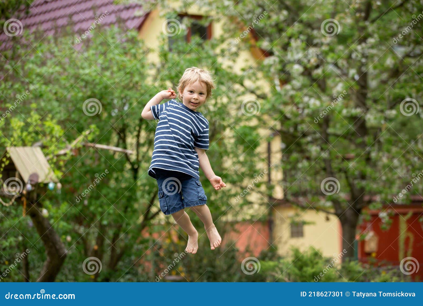 Child, Jumping High on a Trampoline Stock Image - Image of laughing ...