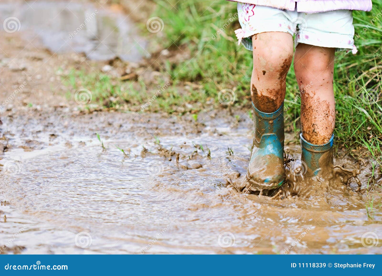Child Jumping in Mud Puddle Stock Image - Image of environment, healthy ...
