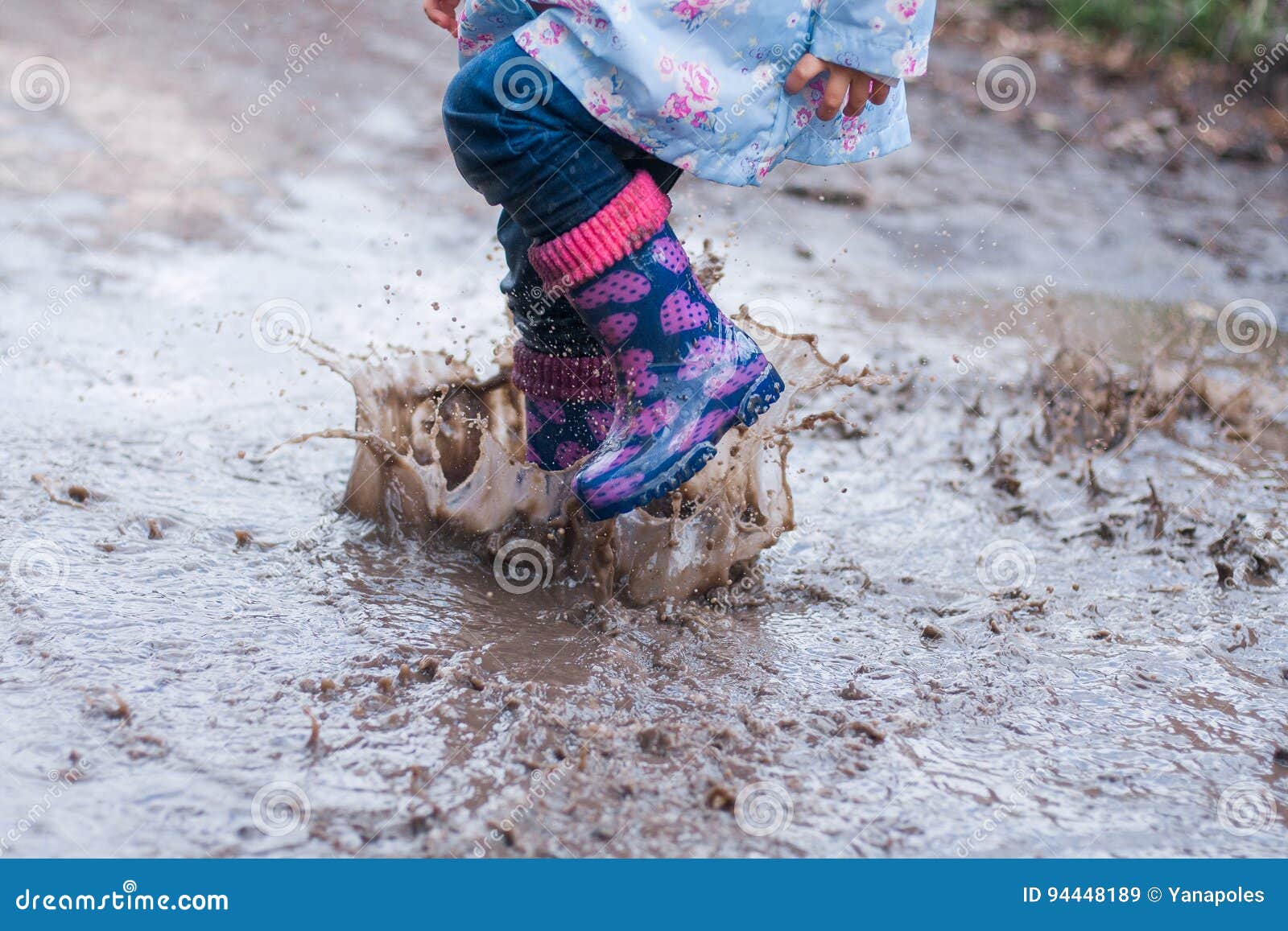 Child Jumping in the Muddy Puddle Stock Image - Image of happy ...