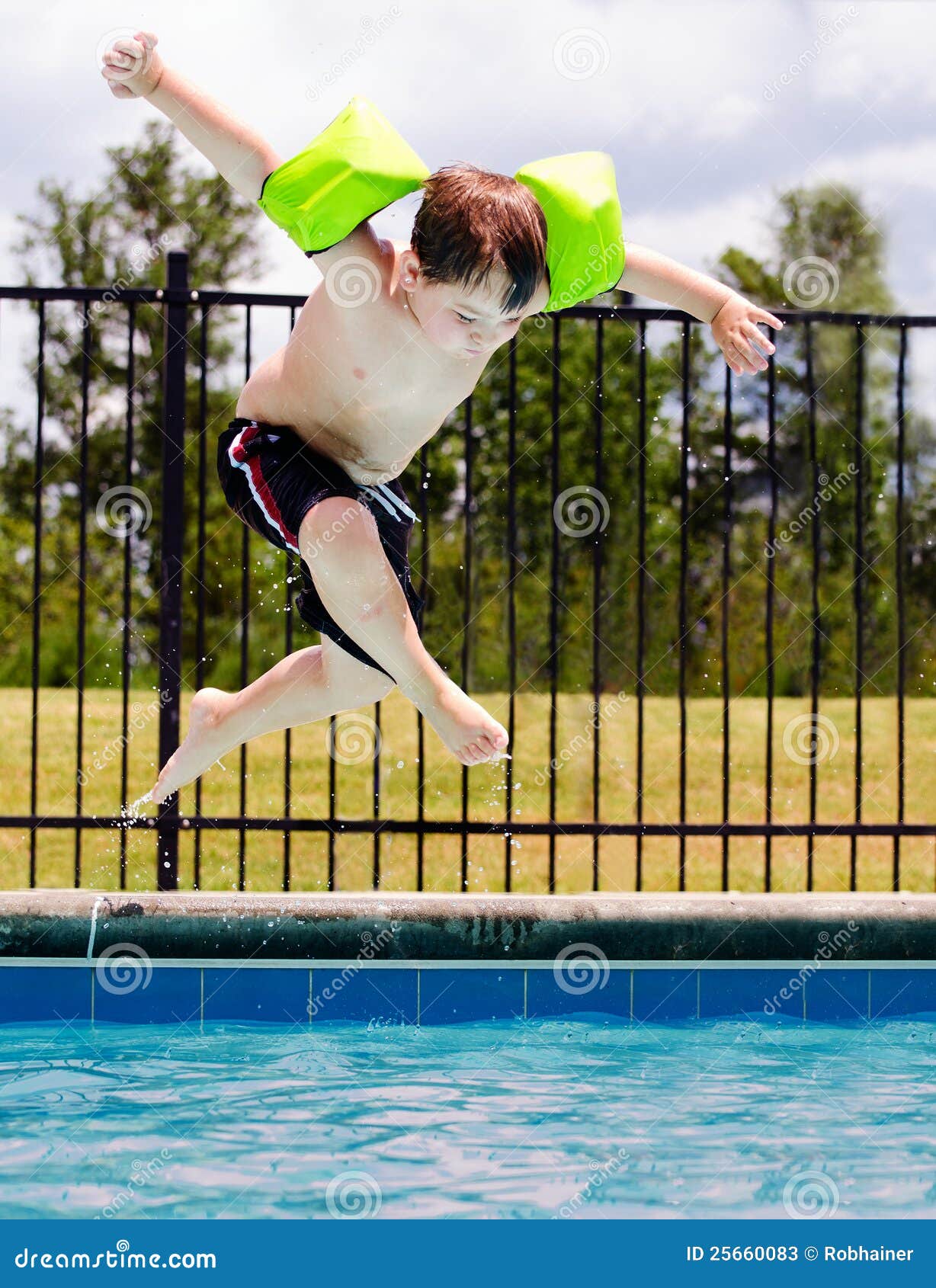 Child jumping into pool stock image. Image of child, entertainment ...
