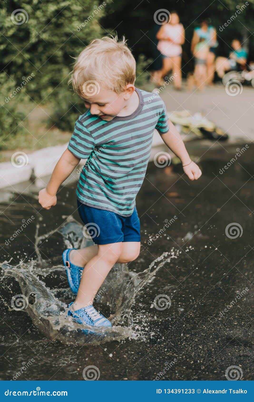 Little Boy Jumping in a Puddle in Summer Stock Image - Image of baby ...