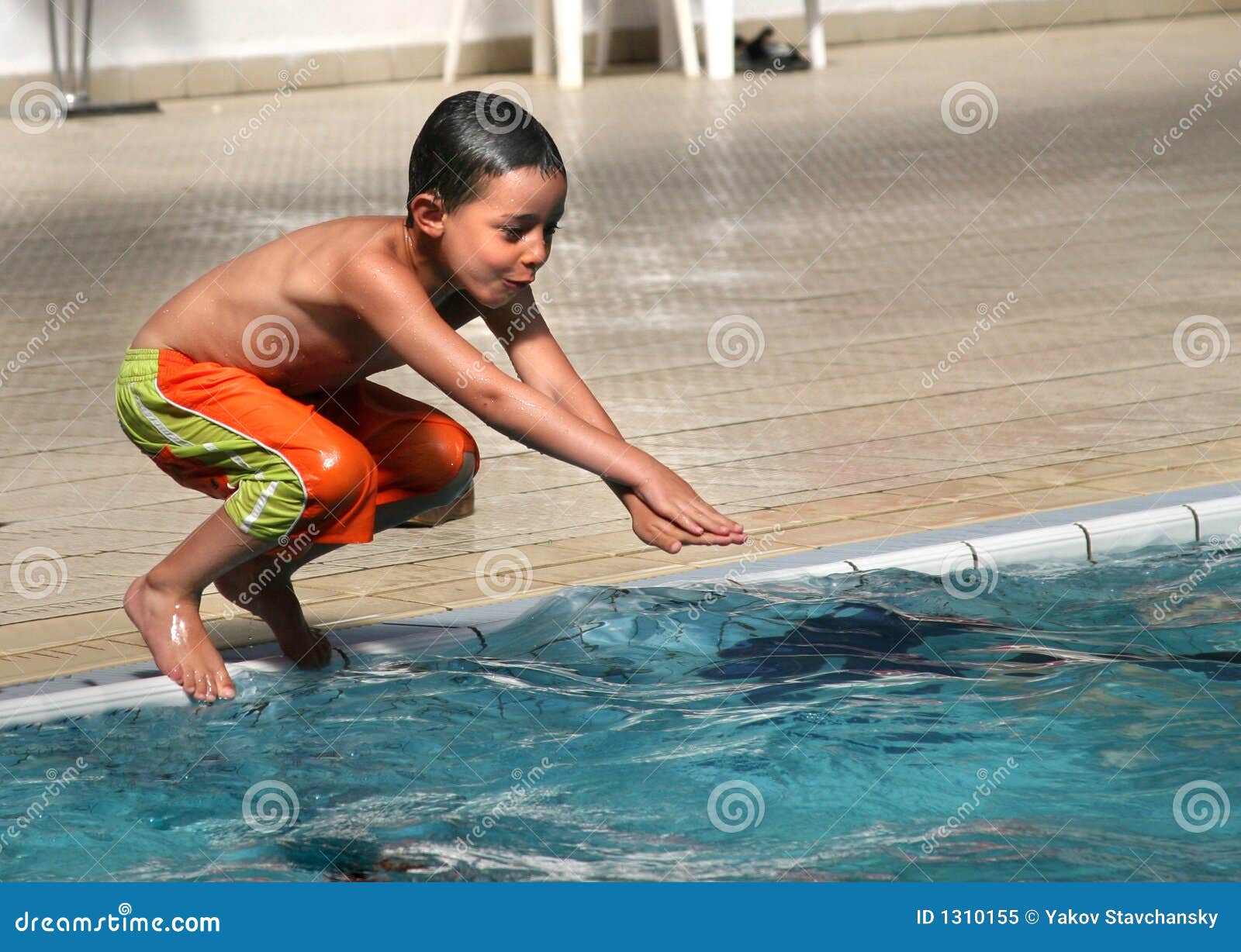The child jumps in water. stock image. Image of olor, pleasure - 1310155