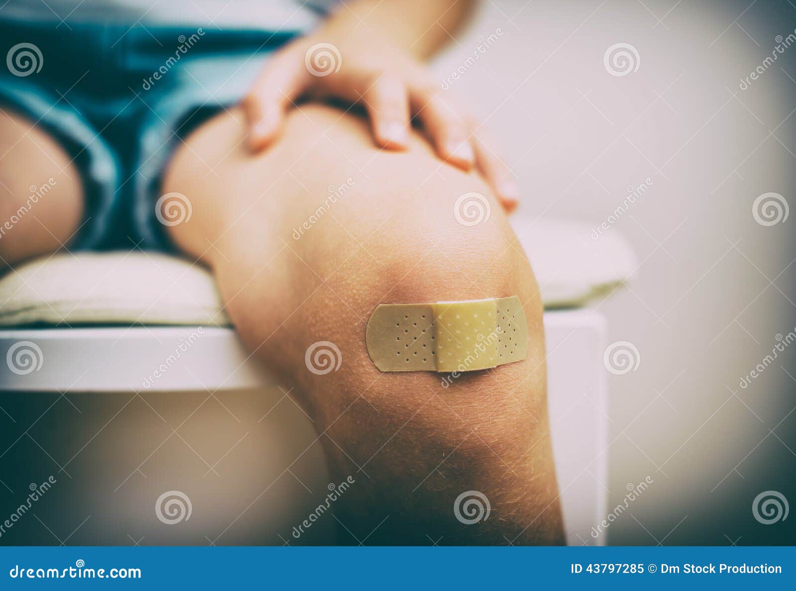 Child Knee with an Adhesive Bandage. Stock Image - Image of bandage ...