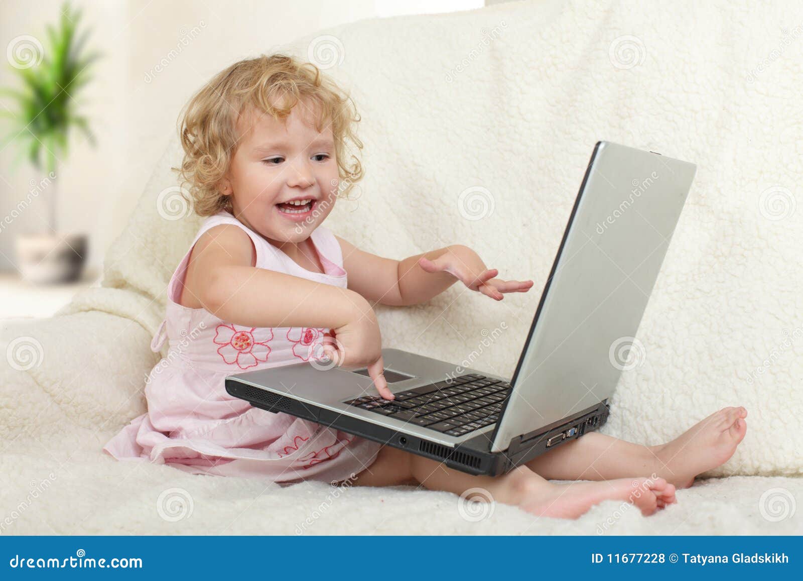 Child with laptop stock photo. Image of caucasian, room - 11677228