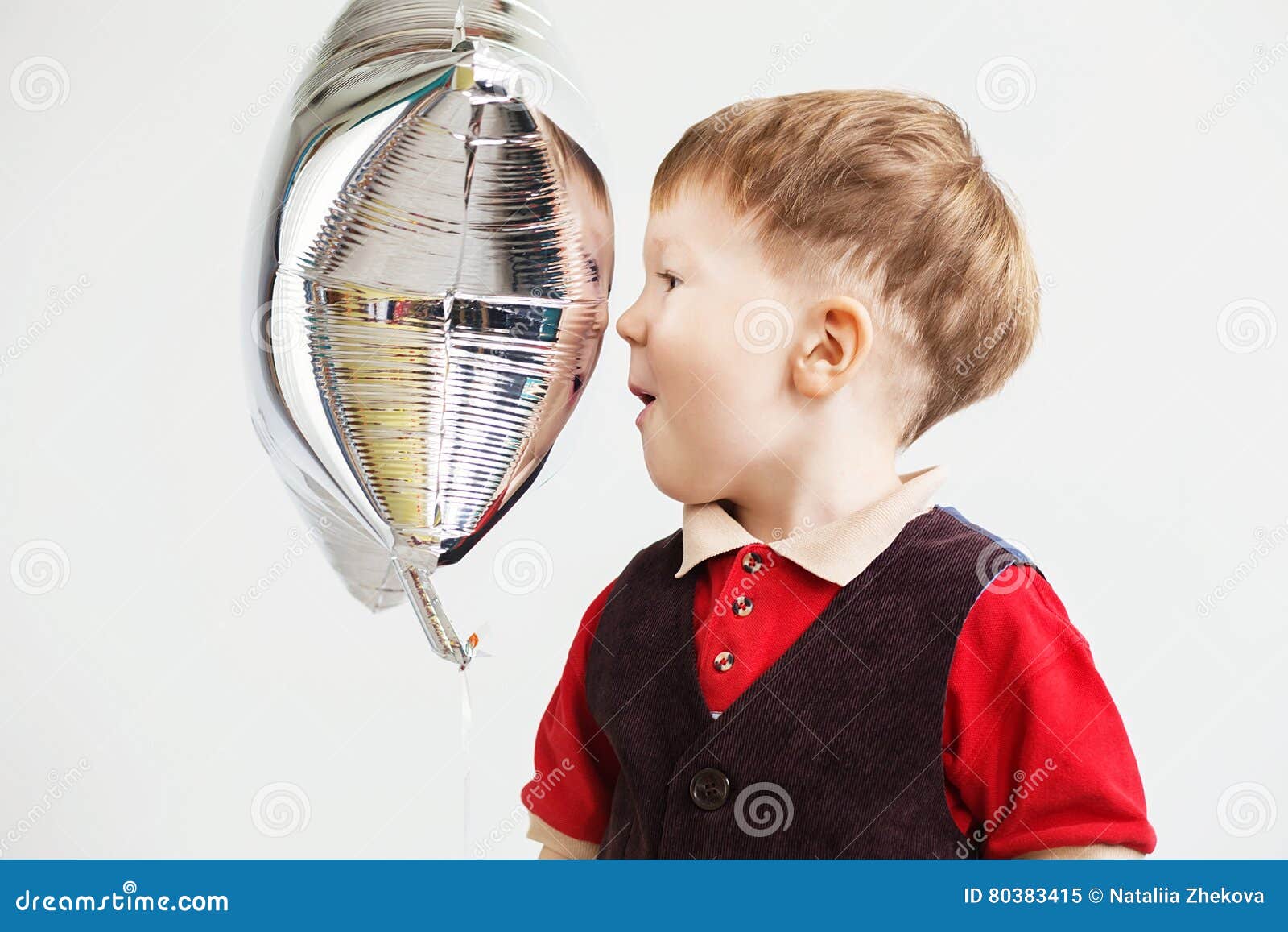 Child Laughing Looking at the Reflection in a Distorted Mirror Stock ...