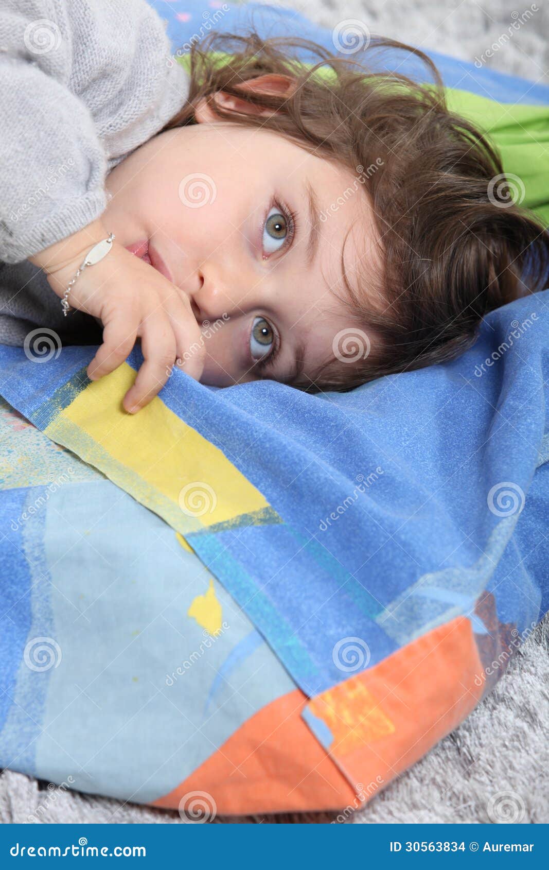 Child laying on a rug stock photo. Image of healthy, bright - 30563834