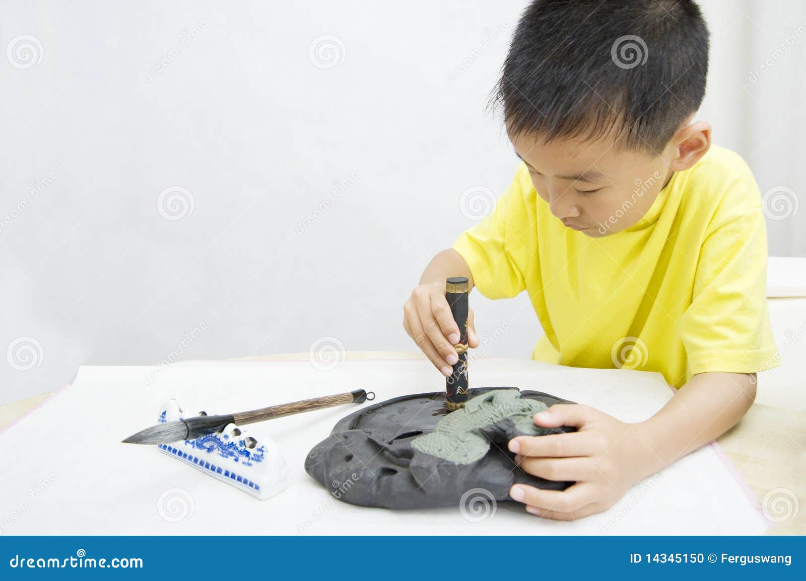 A Child Learning Chinese Calligraphy Stock Photo - Image of childhood ...