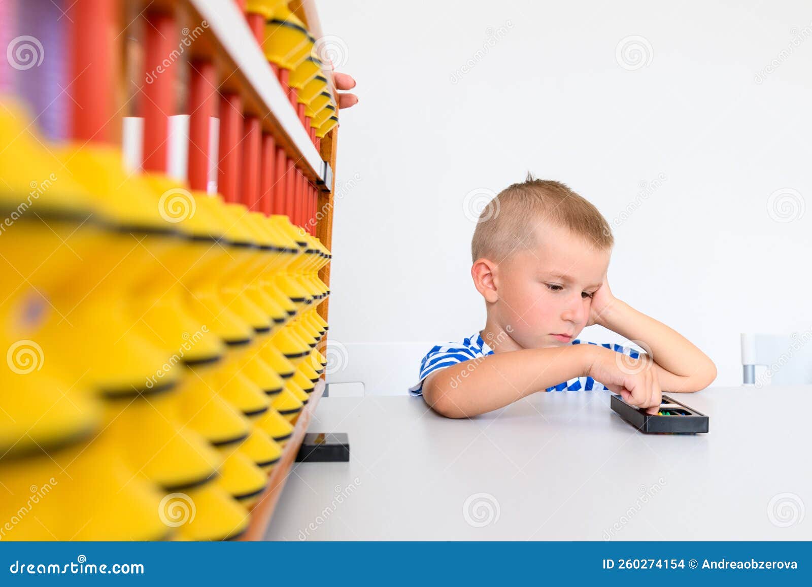 Child with Learning Difficulty in Occupational Therapy. a Boy Doing ...