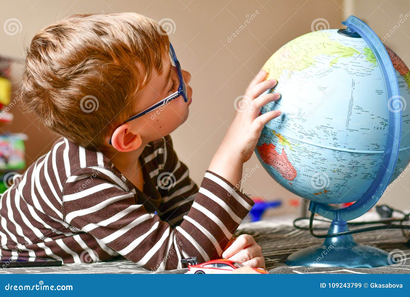 Child Learning Geography with Globe at Home Stock Image - Image of ...
