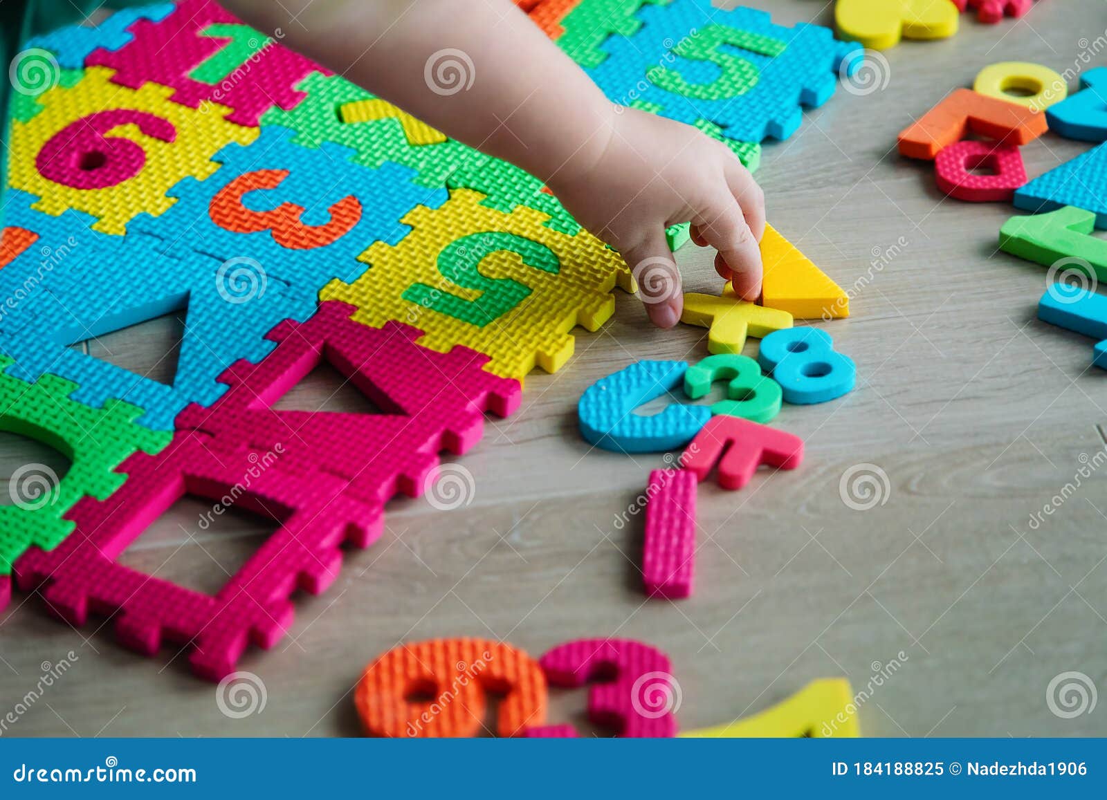 Child Learning Numbers and Math, Kid Playing Puzzle Stock Image - Image ...