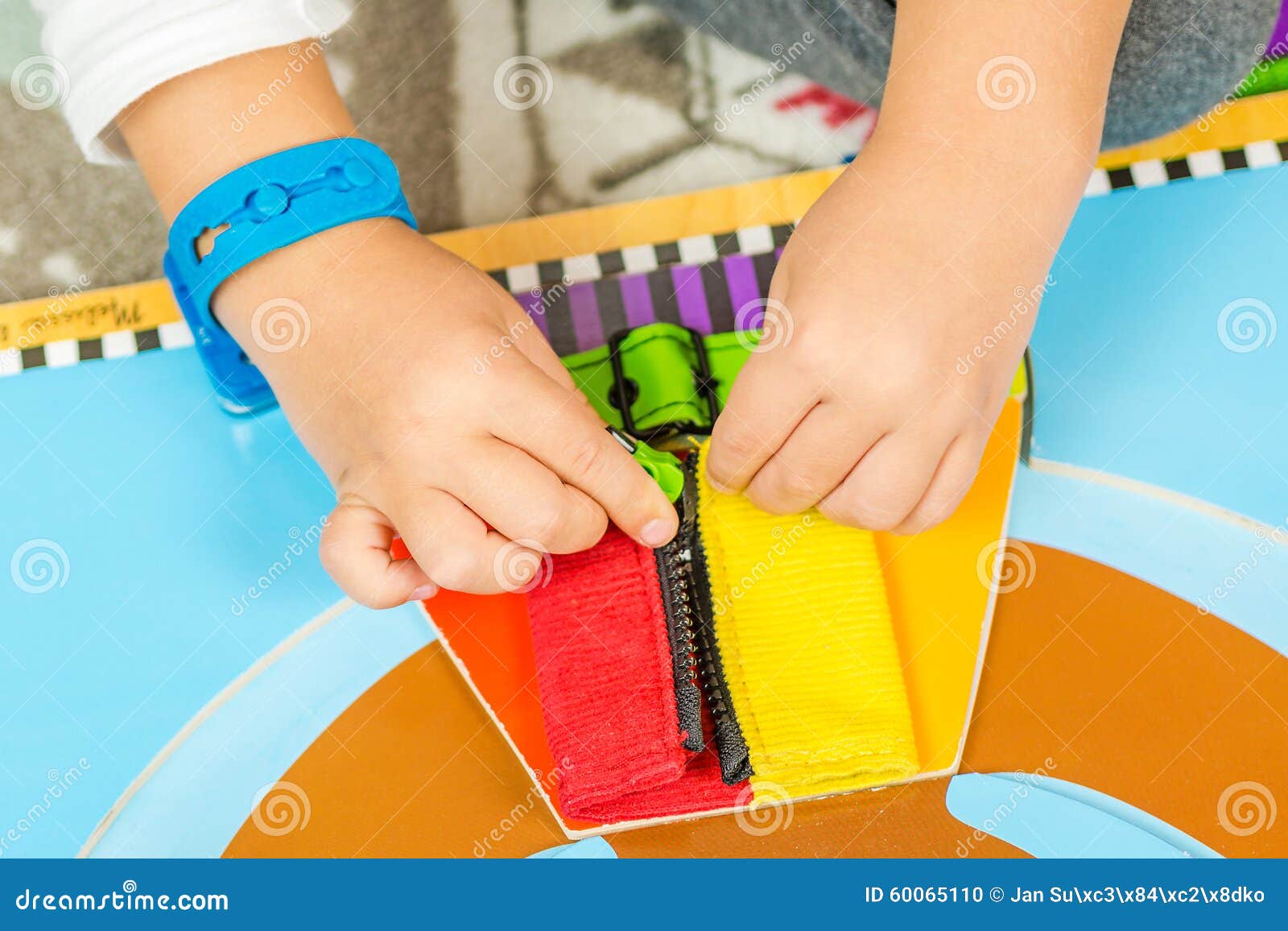 Child is Learning To Do Up Zip Stock Photo - Image of childhood, little ...