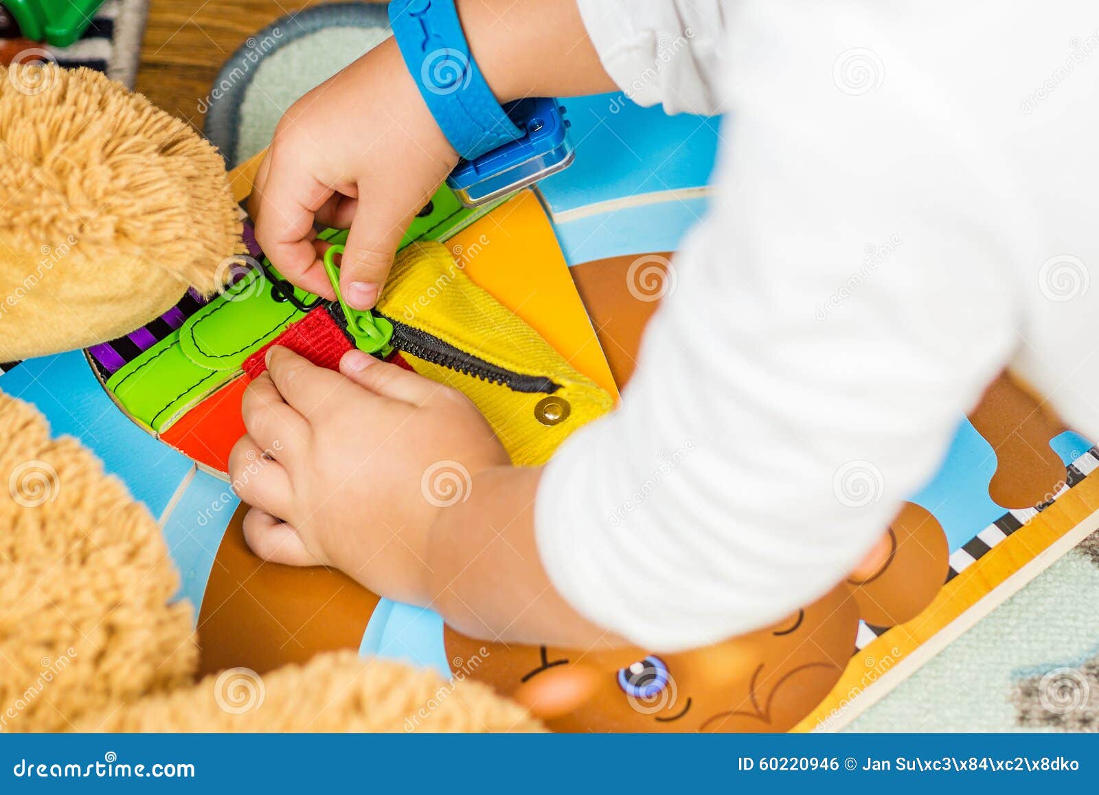 Child is Learning To Do Up Zip Stock Photo - Image of white, tighten ...