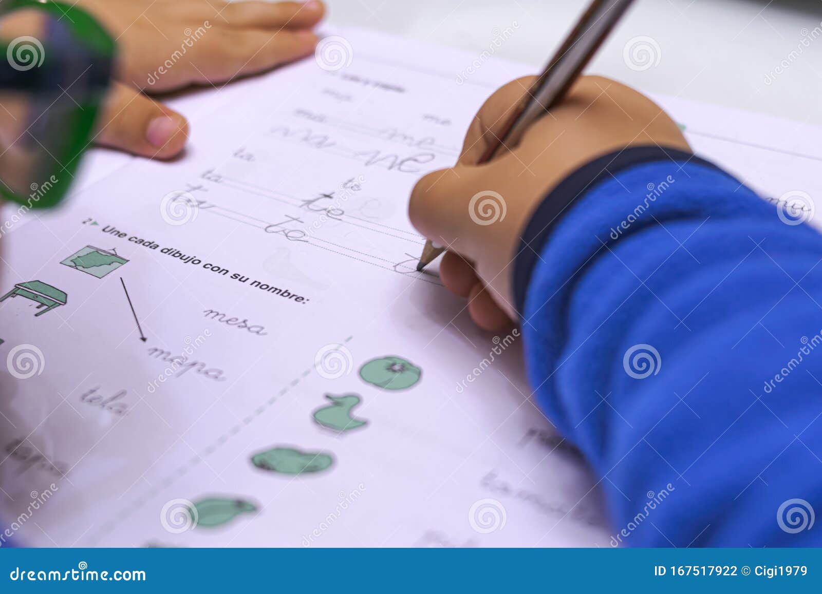 Child Learning To Write and Doing Homework at School Stock Photo ...