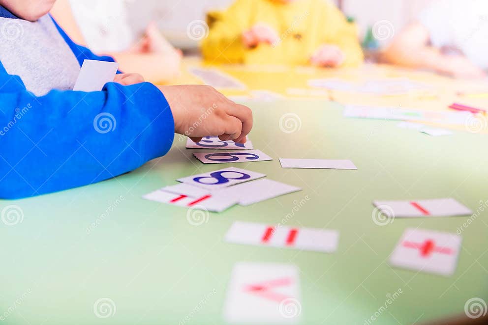 The Child Learns To Count by Adding Numbers Stock Photo - Image of exam ...