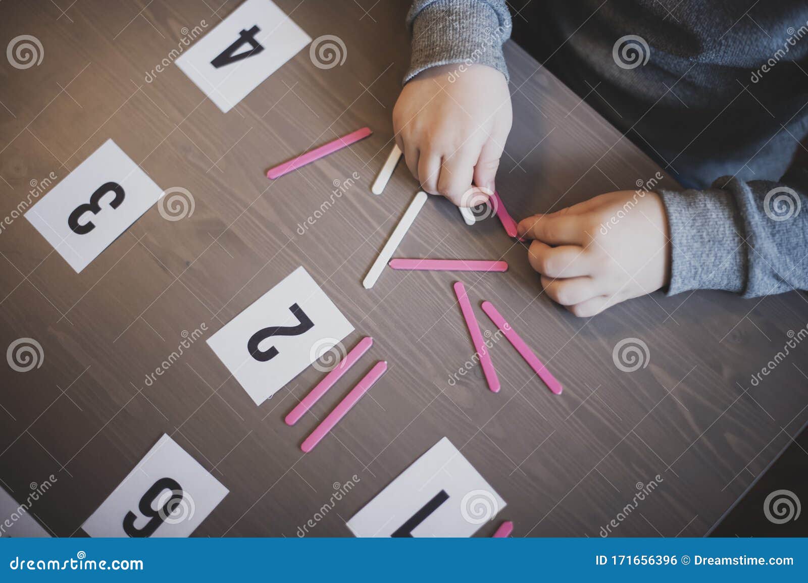 The Child Learns To Count Using Counting Sticks and Learns Numbers ...