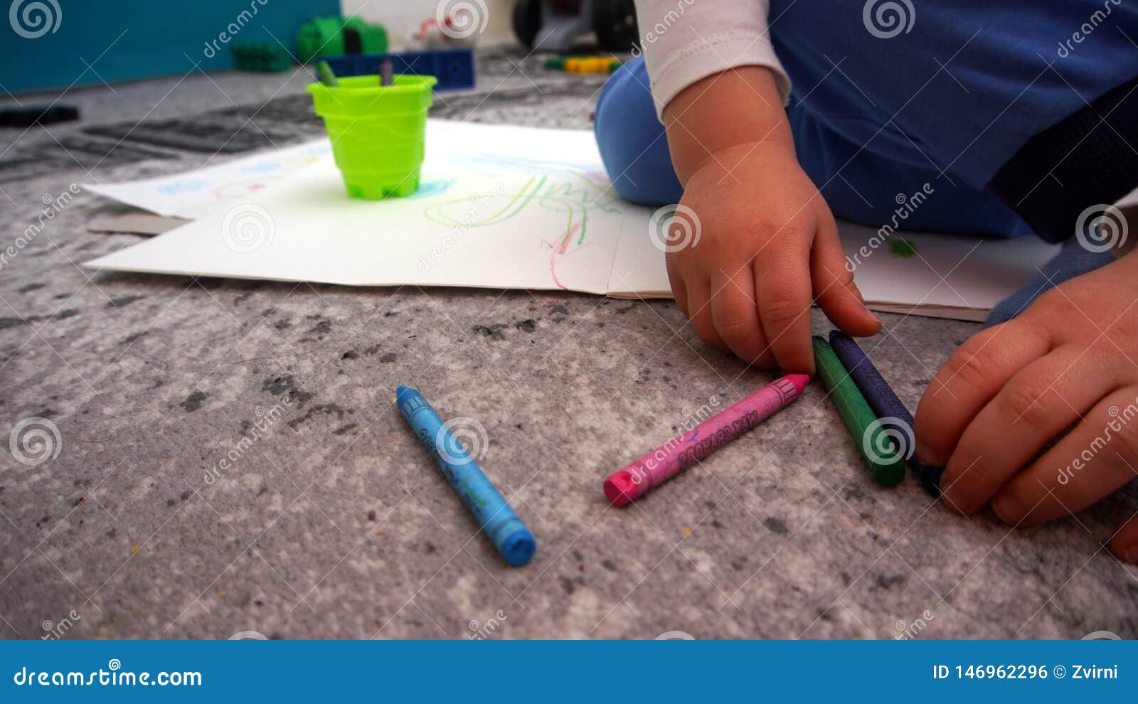 The Child Learns To Draw Wax Crayons on the Floor Stock Photo - Image ...