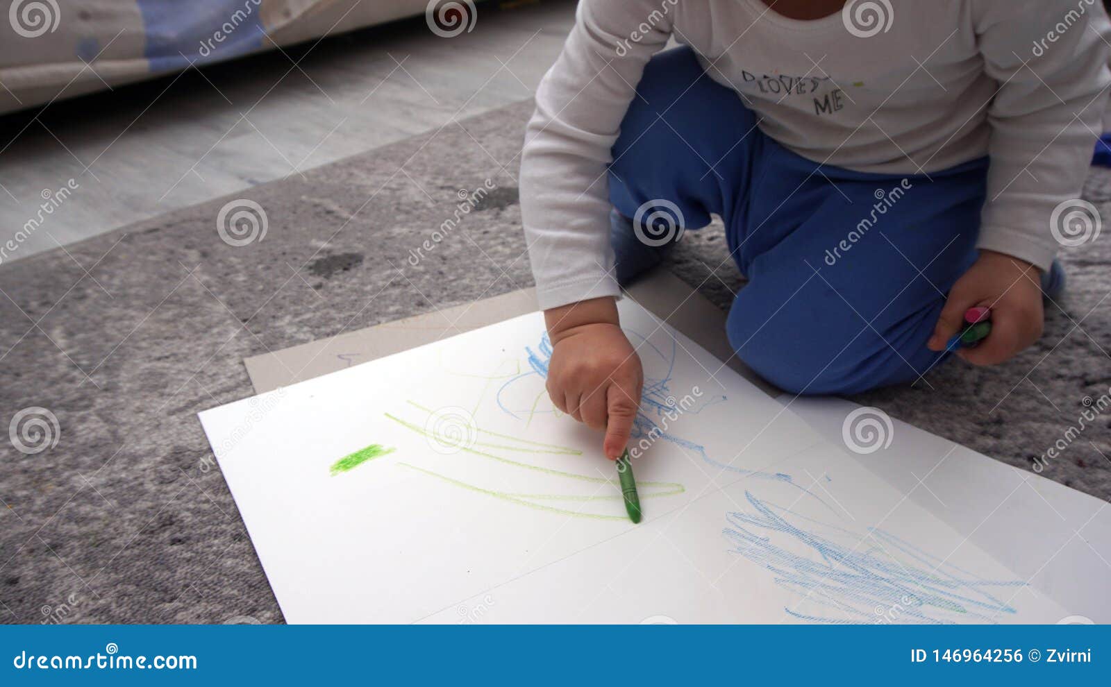 The Child Learns To Draw Wax Crayons on the Floor Stock Photo - Image ...