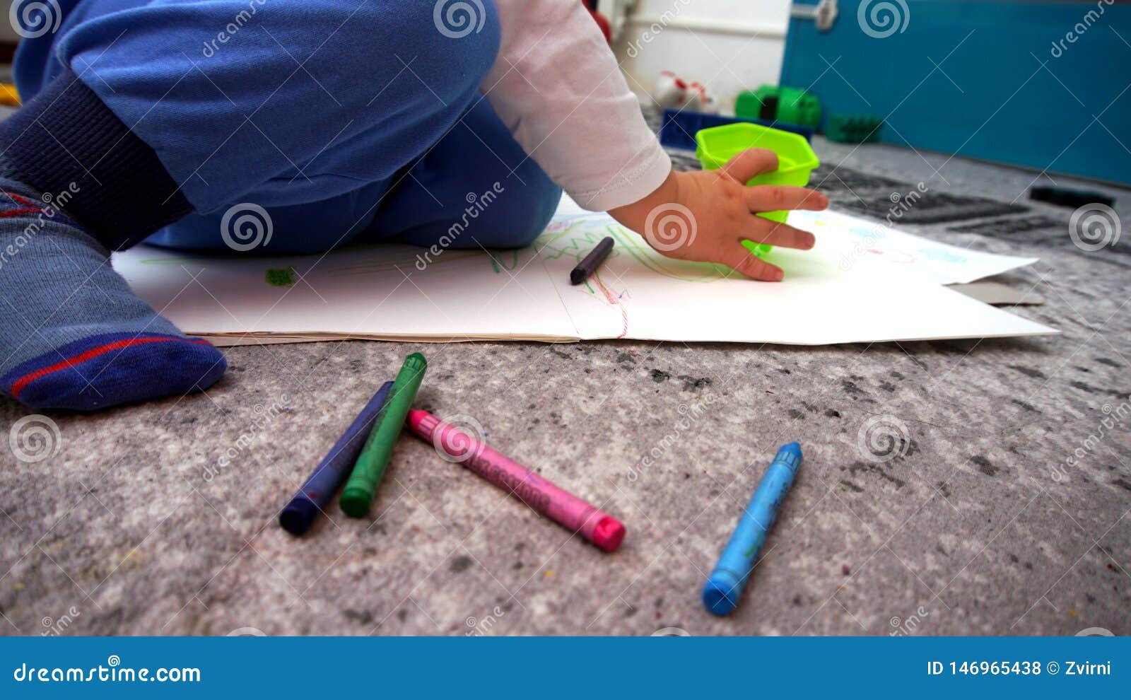 The Child Learns To Draw Wax Crayons on the Floor Stock Photo - Image ...