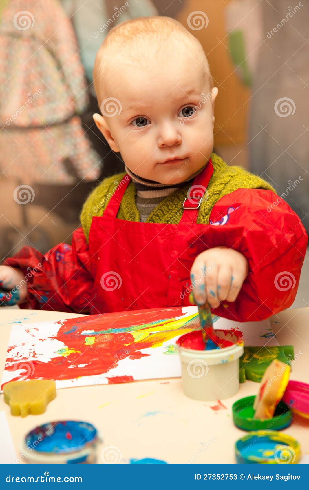 A child learns to paint stock image. Image of creativity - 27352753