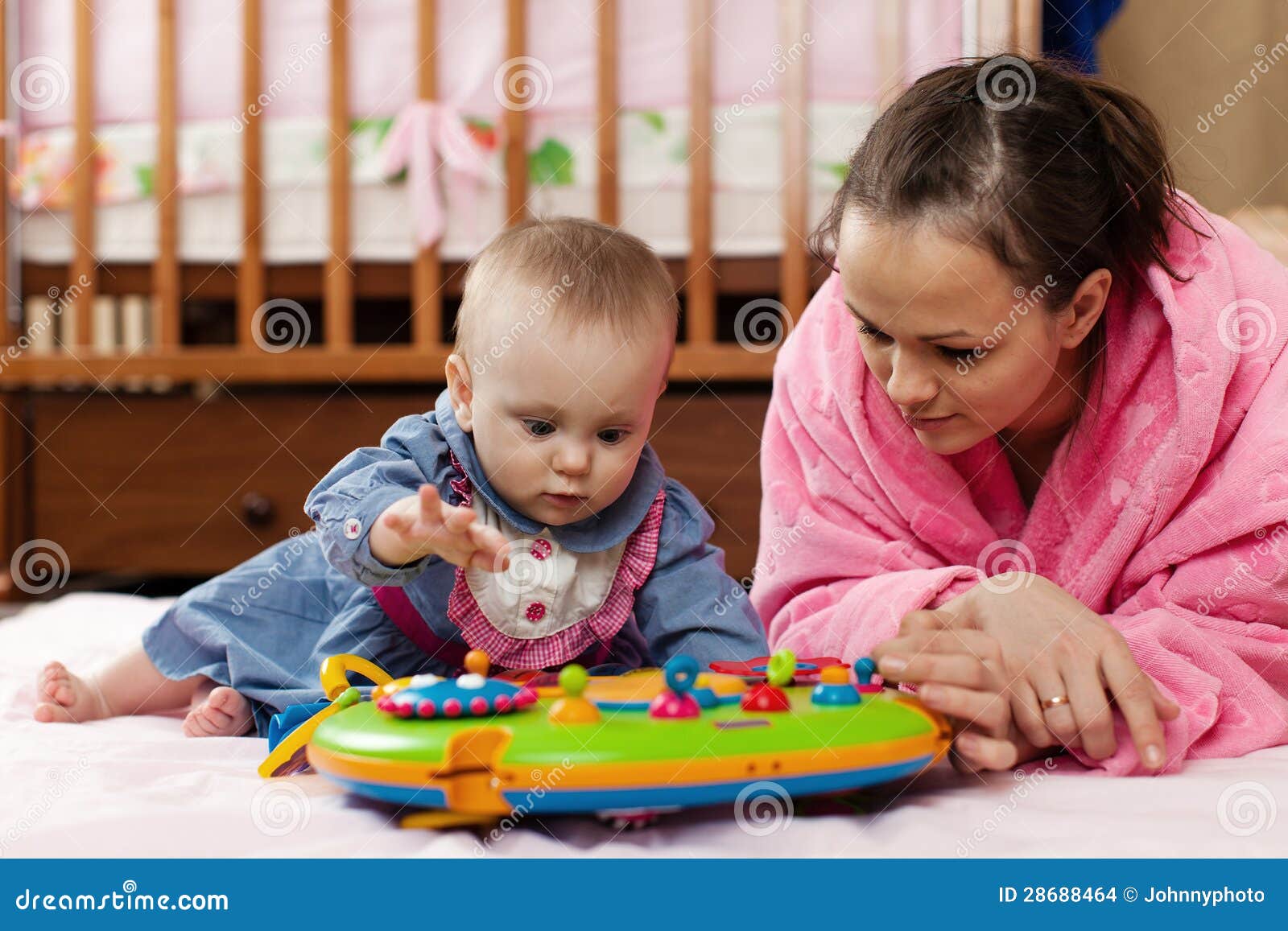 The Child Learns the World. Stock Photo - Image of baby, cheerful: 28688464 The Child Learns the World. Stock Photo - Image of baby, cheerful: 28688464