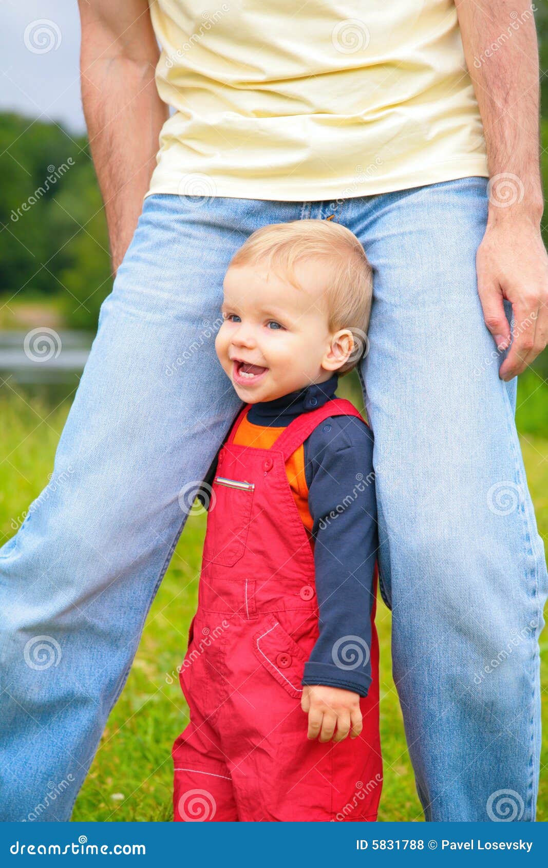 Child at legs of father stock photo. Image of adorable - 5831788