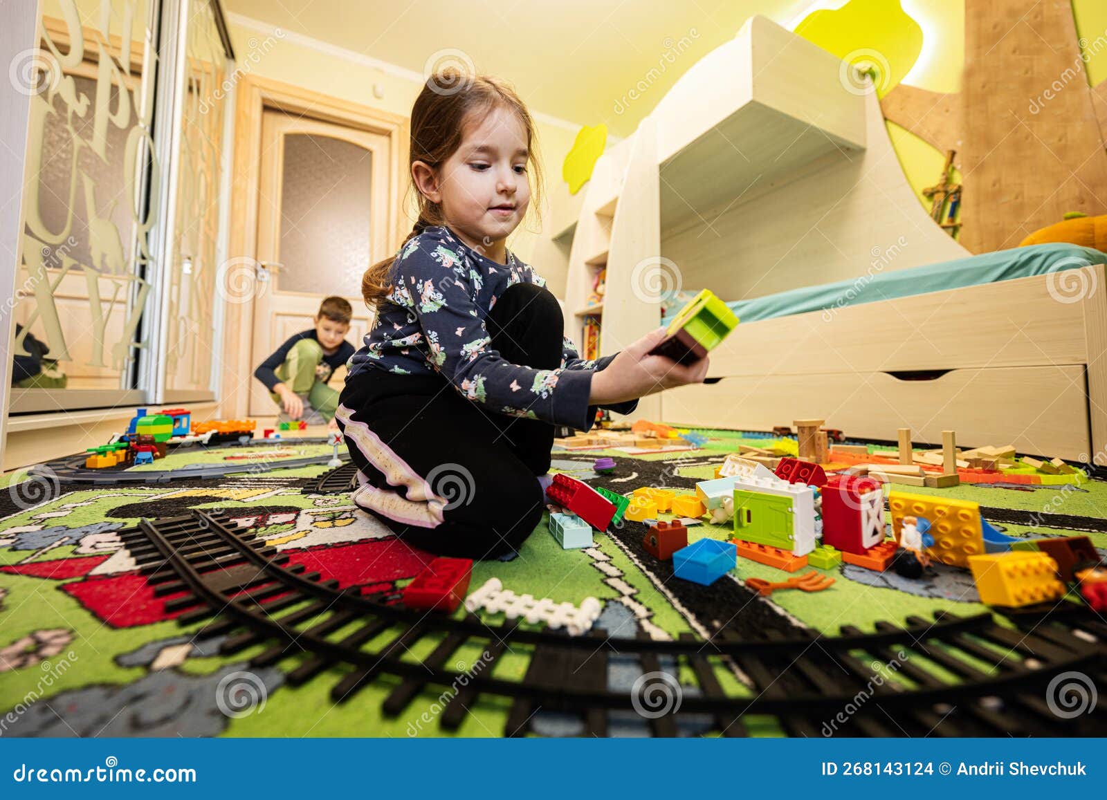 Child Leisure Activity, Creative Game. Kids Play at Home with Toy Train ...
