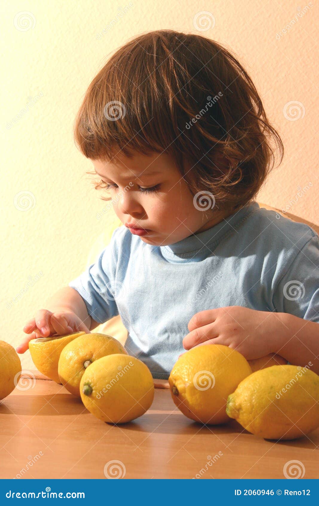 Child and lemons stock photo. Image of little, fruit, tasty - 2060946