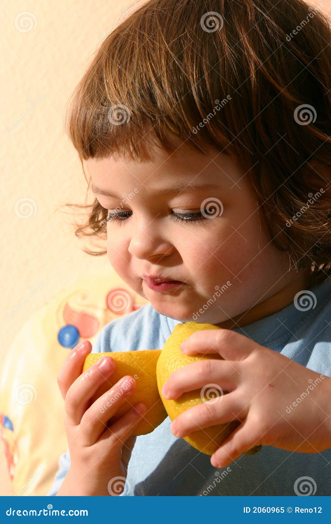 Child and lemons stock image. Image of peckish, nutrition - 2060965