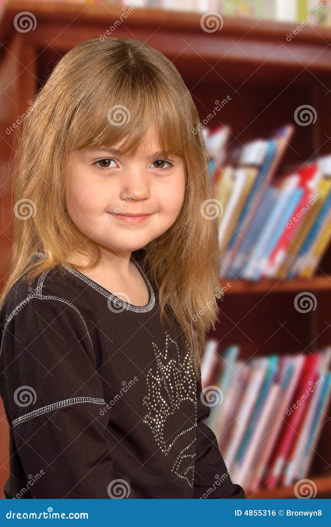 Child in Library stock photo. Image of enjoyment, girl - 4855316